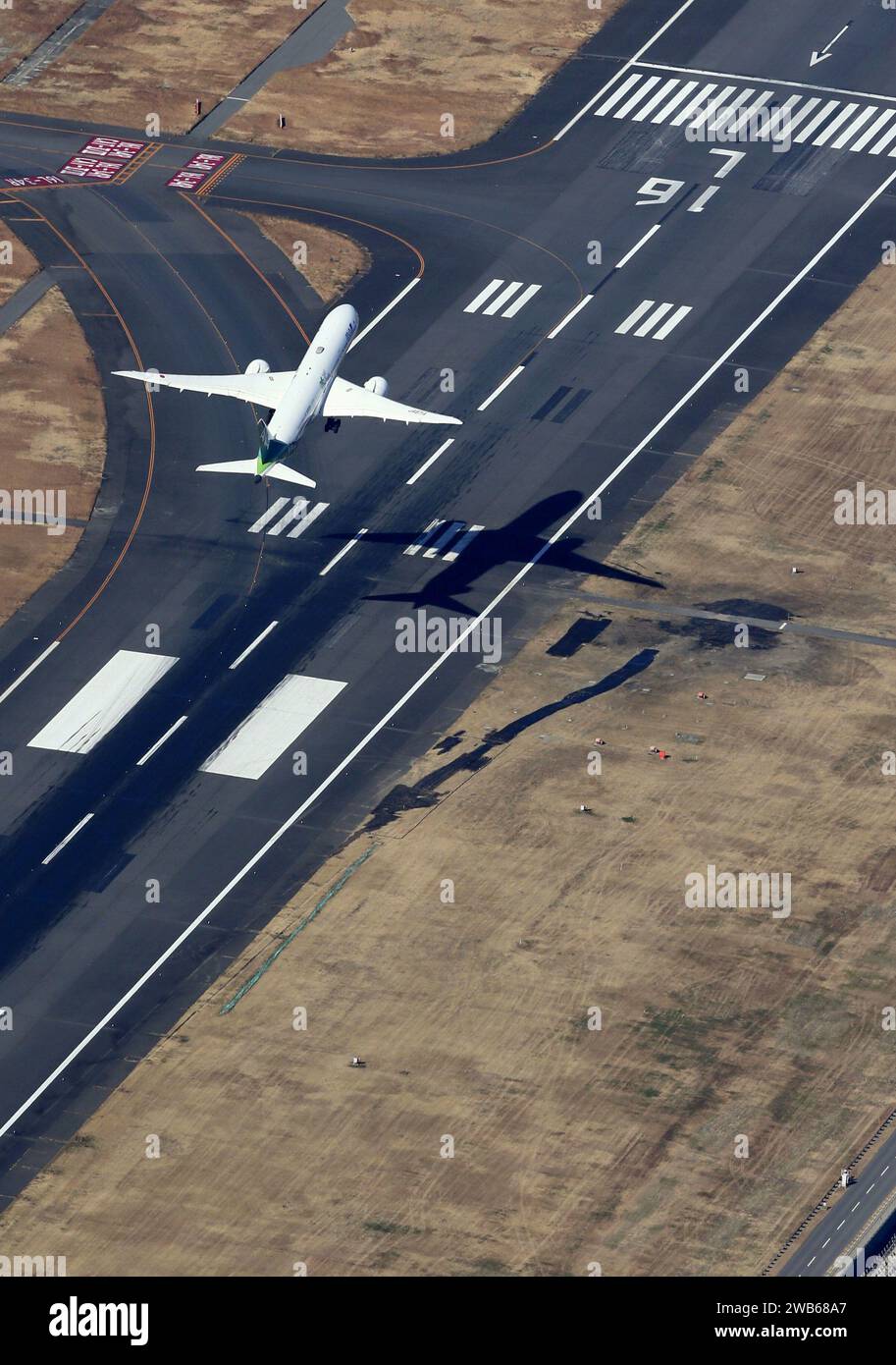 Photo taken from a Kyodo News helicopter shows Runway C at Haneda ...