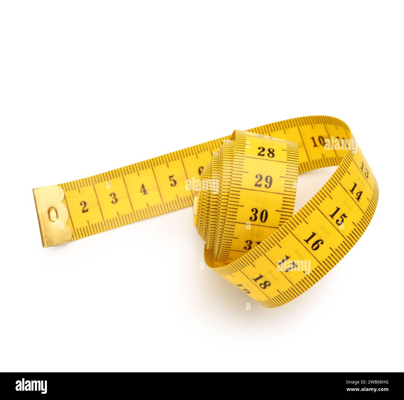 Yellow measuring tape isolated on white background Stock Photo - Alamy