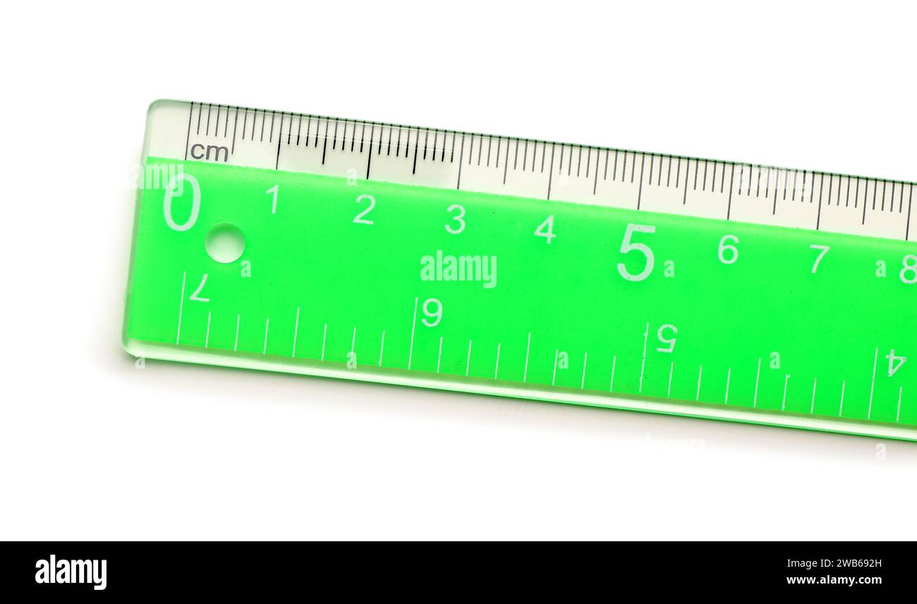 Green plastic ruler on white background Stock Photo - Alamy