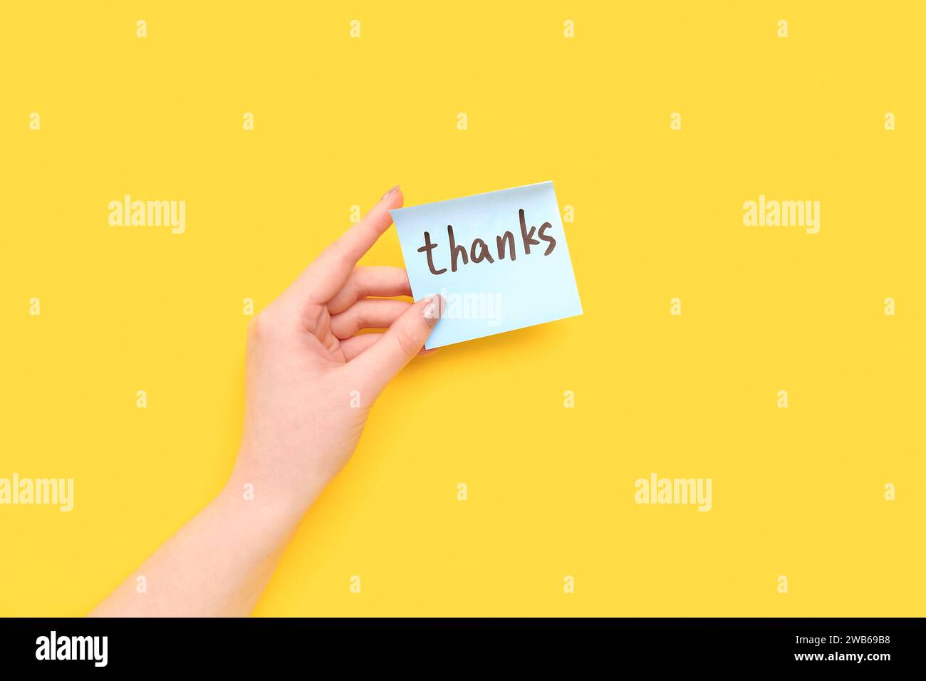 Hand holding sticky note written note hi-res stock photography and ...