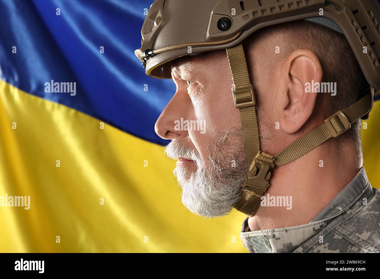 Mature soldier against flag hi-res stock photography and images - Alamy