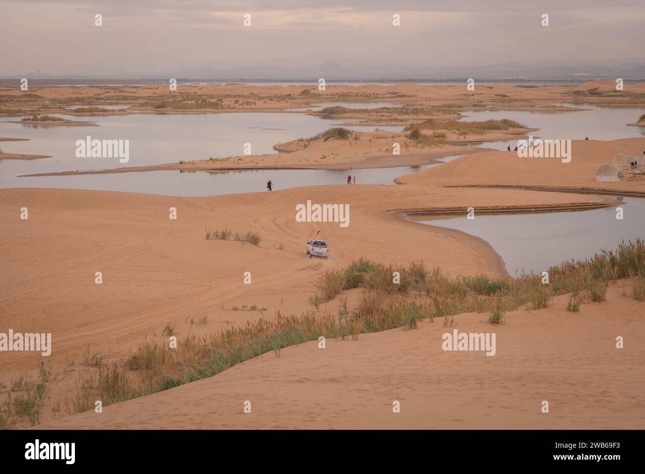 The river going through the desert in Wuhai, Inner Mongolia, China ...