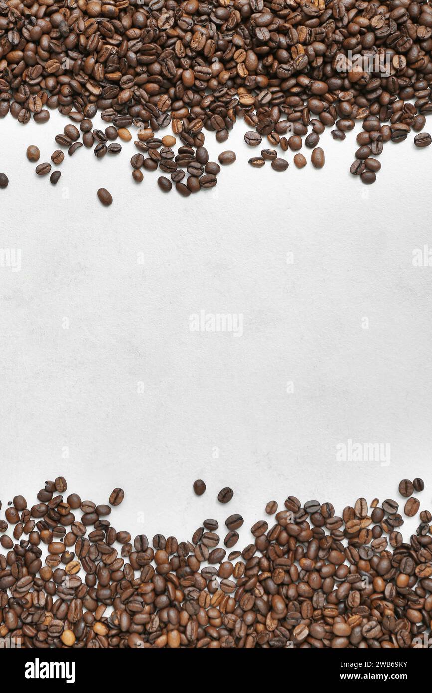 Frame made of coffee beans on light background Stock Photo - Alamy