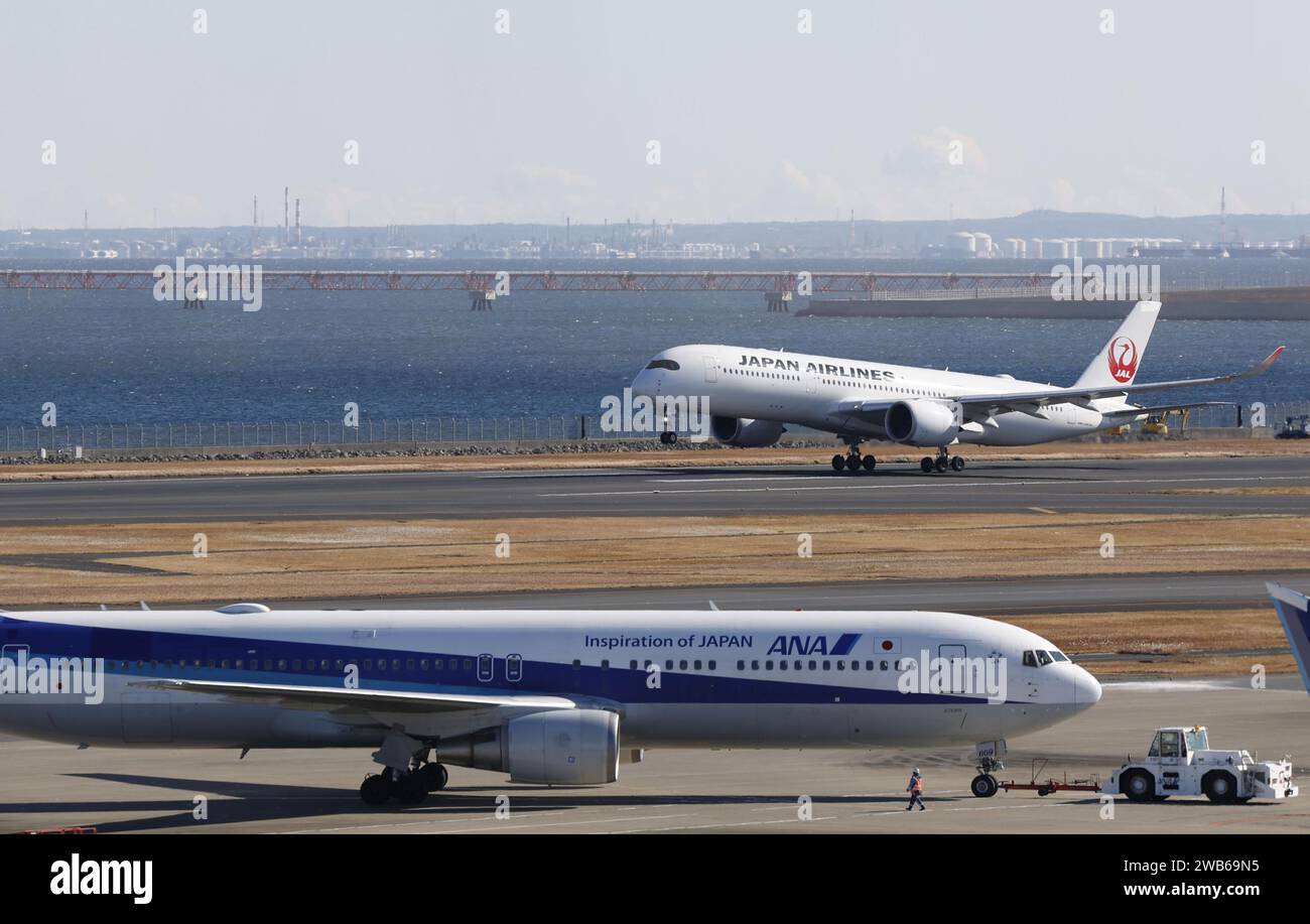 Photo shows Runway C (top) at Haneda airport in Tokyo after it was ...
