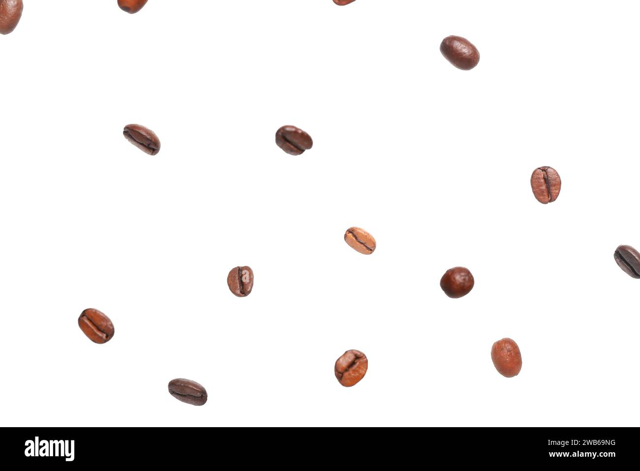 Flying coffee beans on white background Stock Photo - Alamy