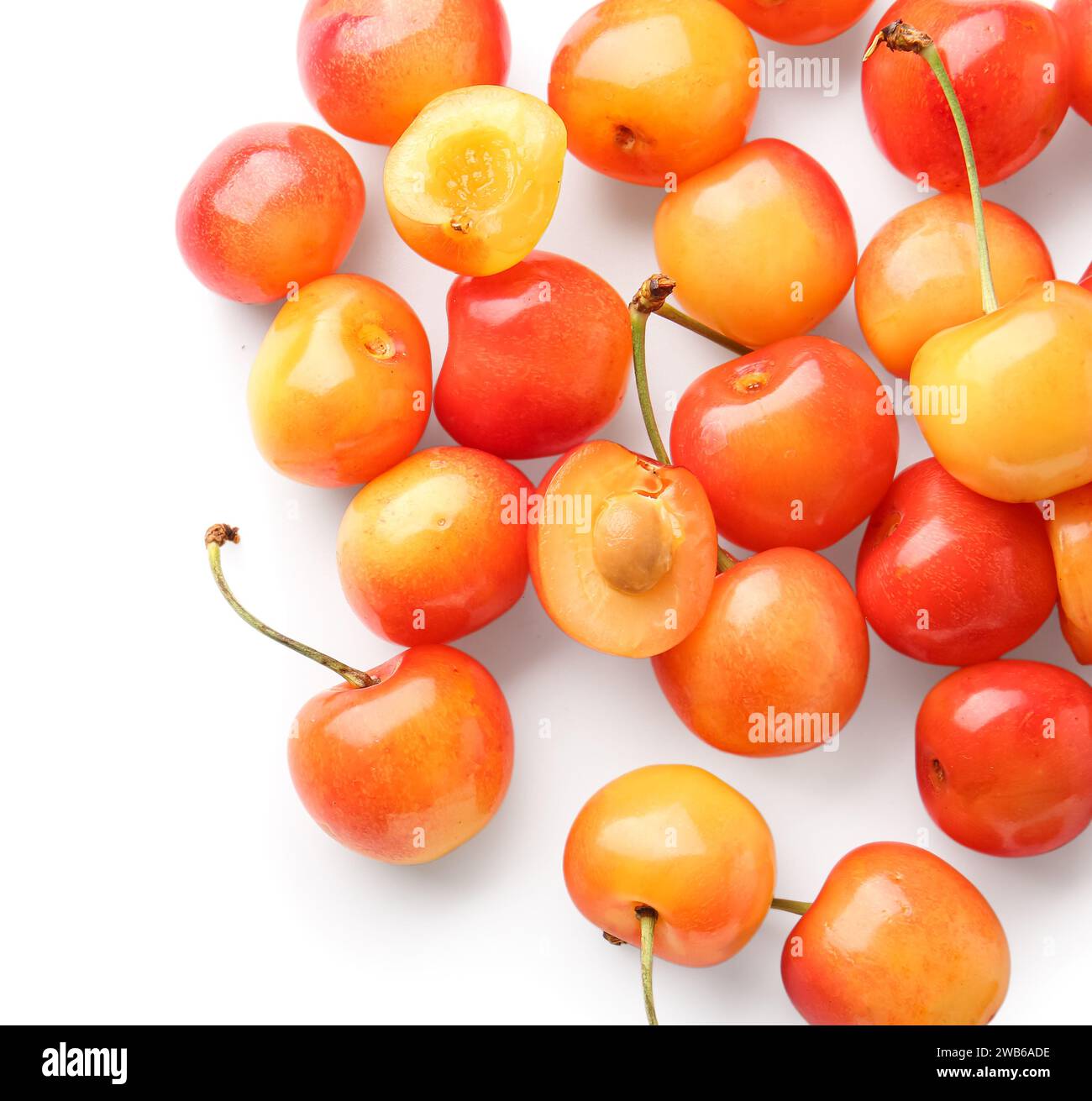 Many sweet yellow cherries on white background Stock Photo - Alamy