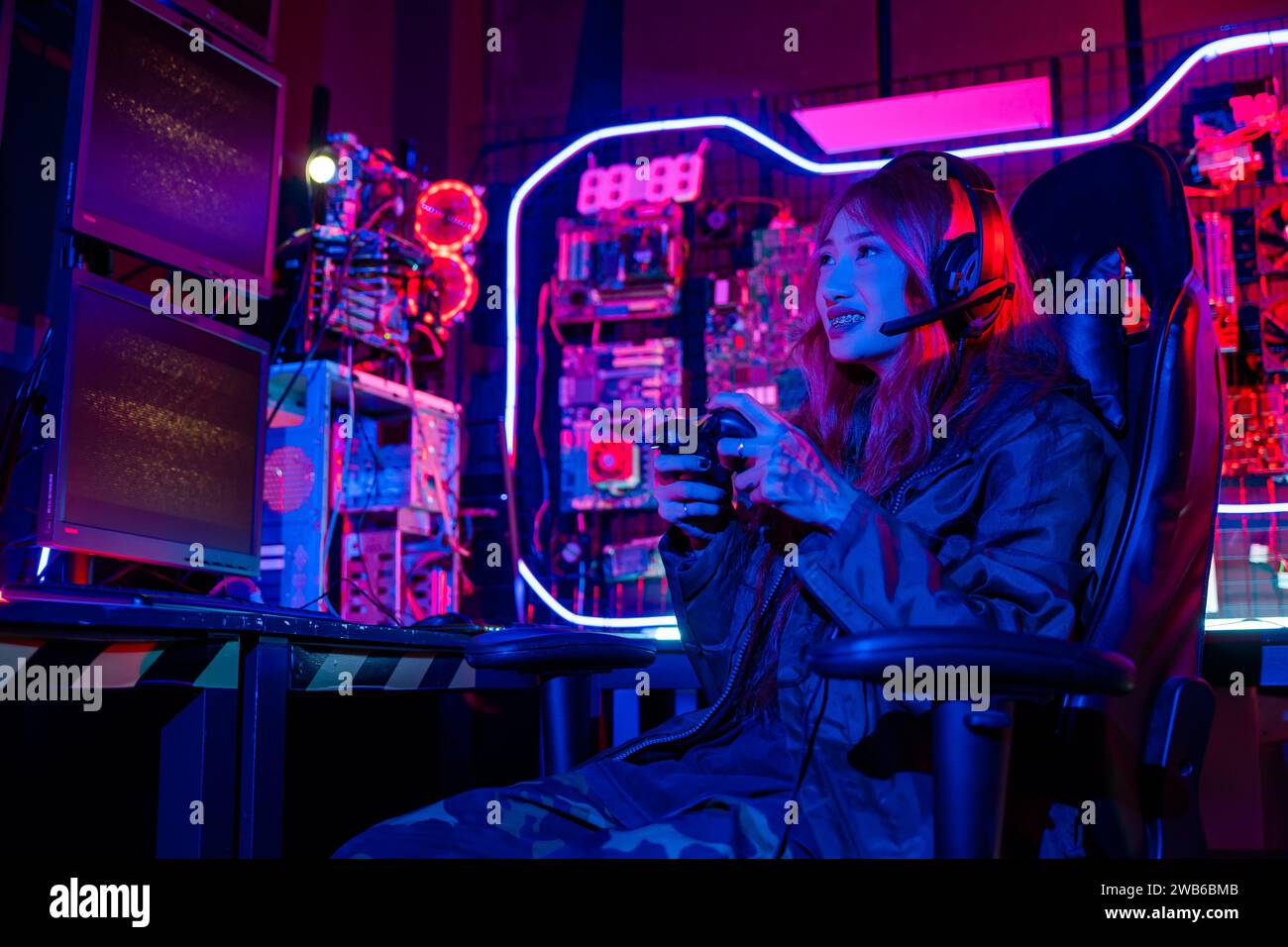 Gamer using joystick controller for virtual tournament plays online ...