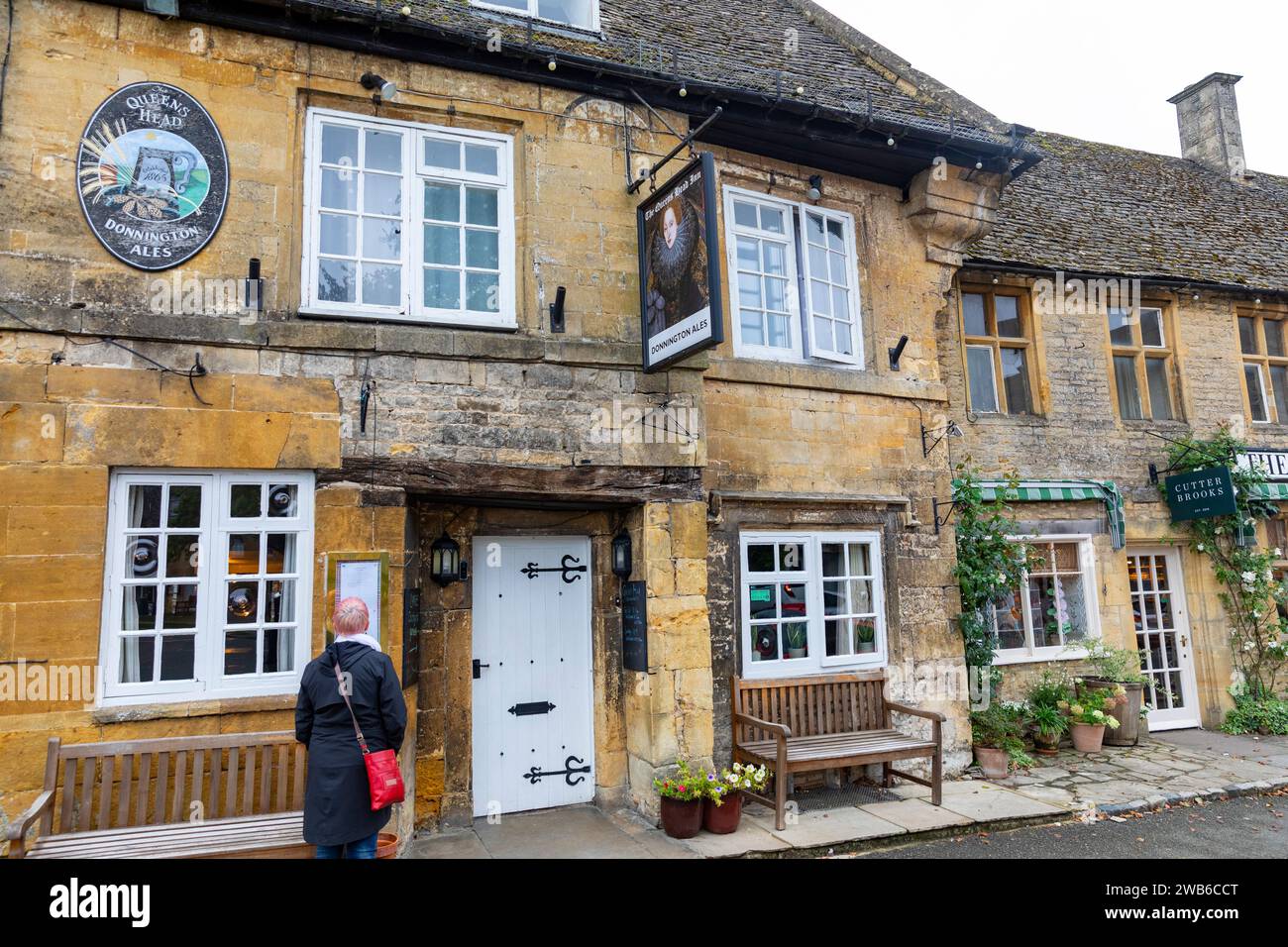 Stow on the Wold Cotswolds, lady reading the food menu outside the ...