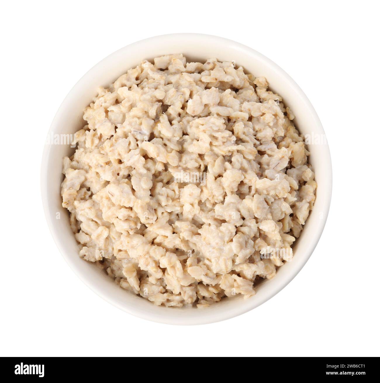 Tasty boiled oatmeal in bowl isolated on white, top view Stock Photo ...