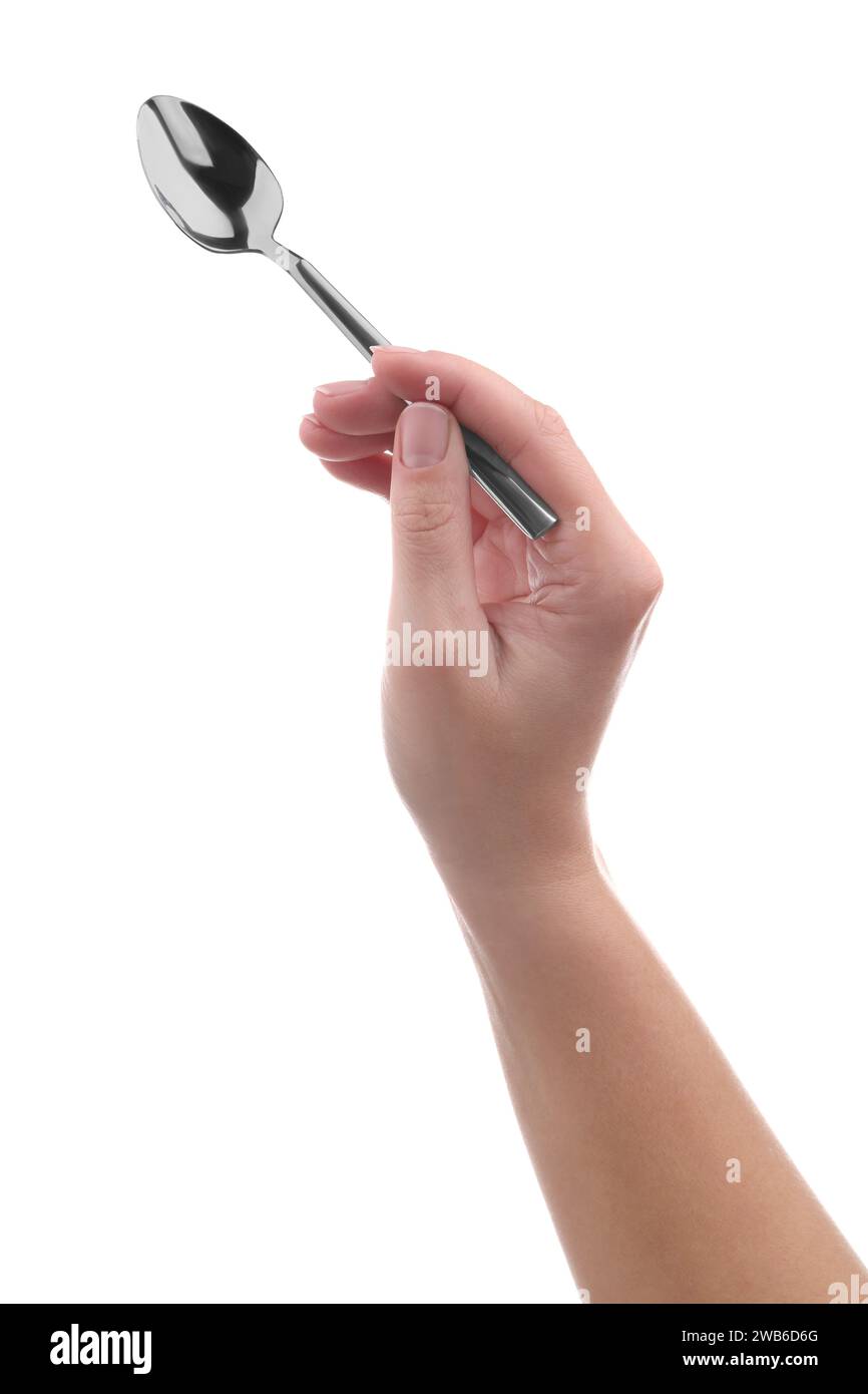 Woman holding new shiny spoon on white background, closeup Stock Photo ...