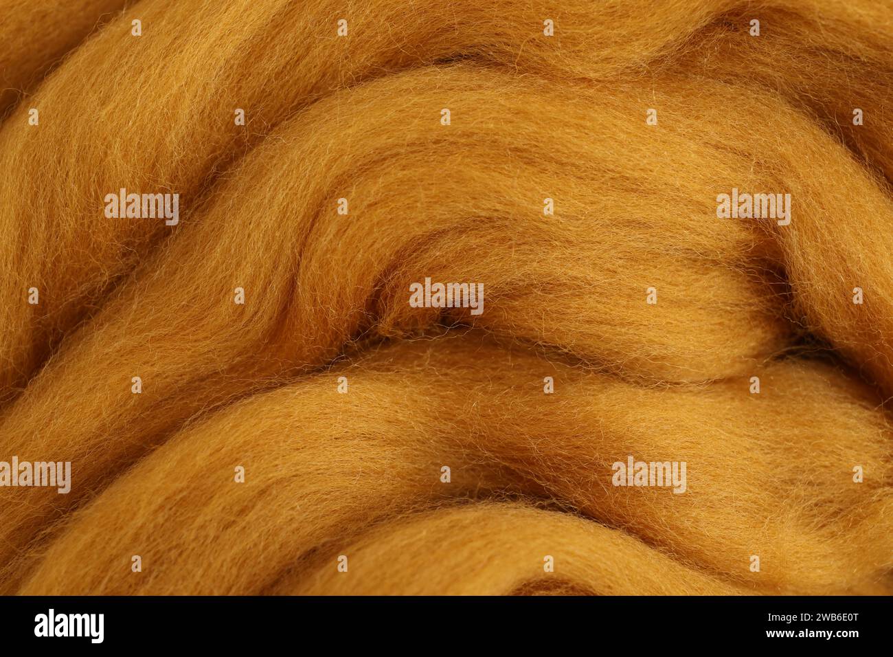 Orange felting wool as background, closeup view Stock Photo - Alamy