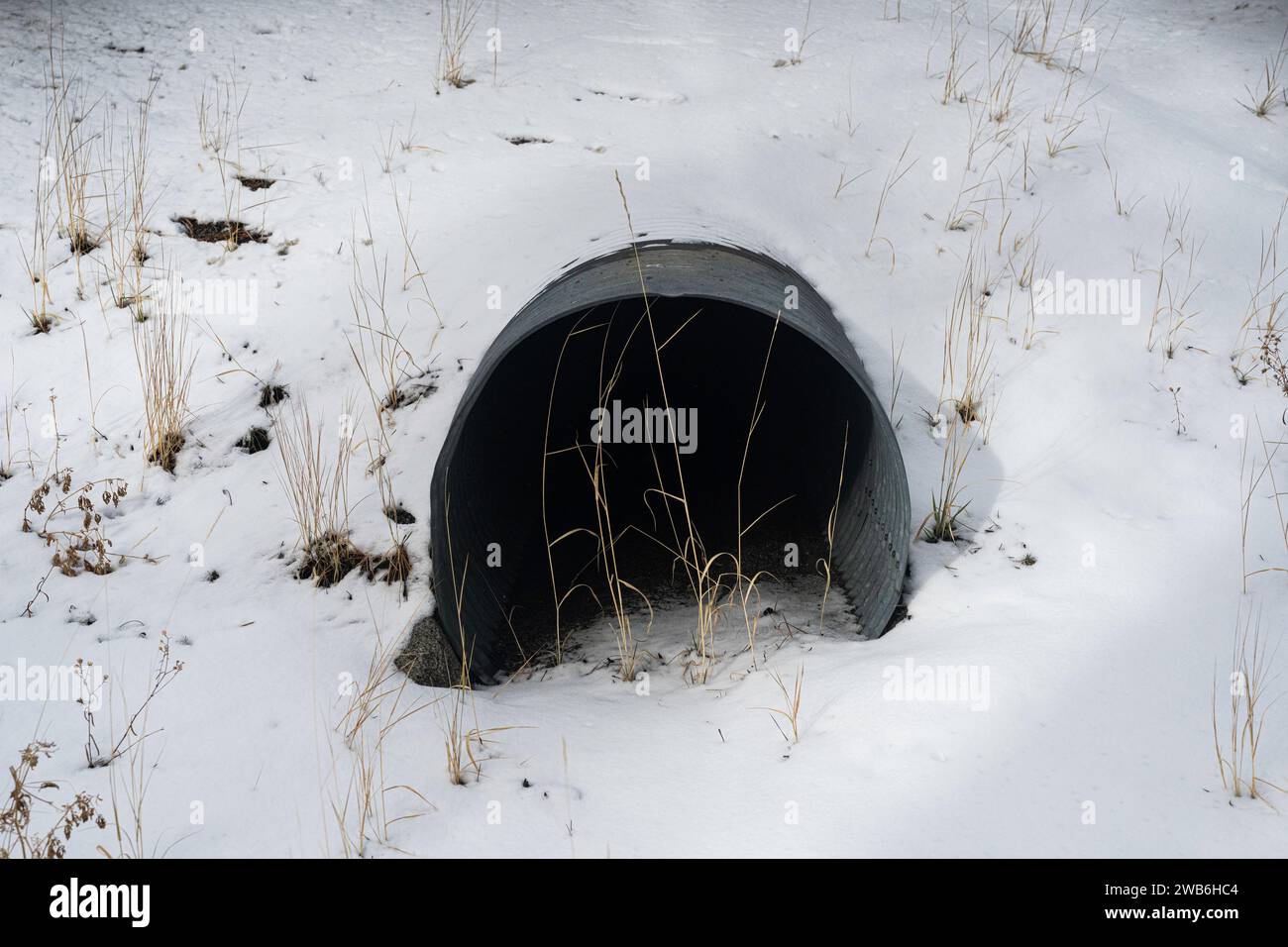 Culvert side view with snow Stock Photo - Alamy