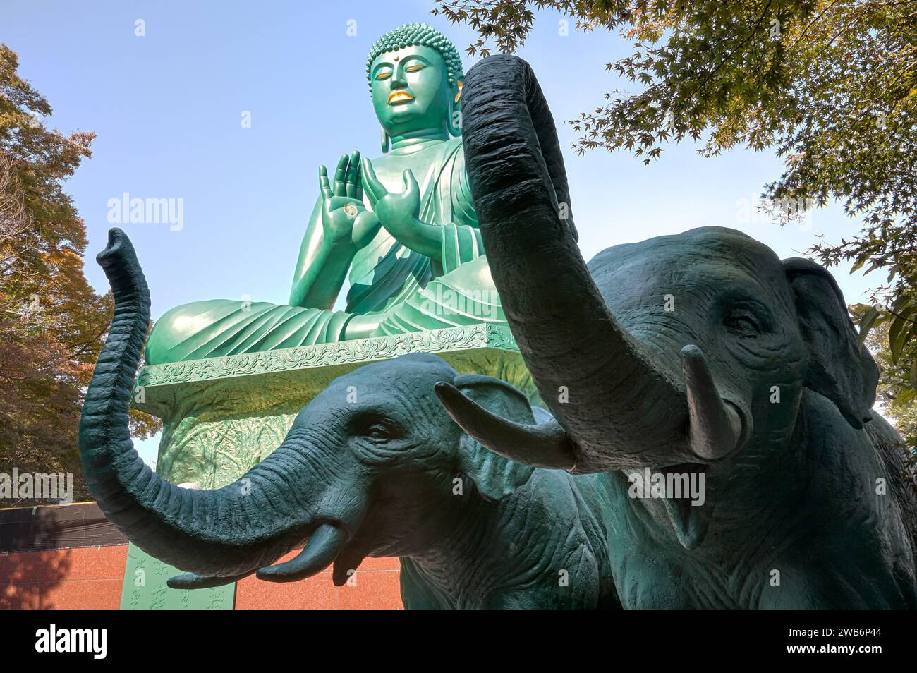 The figures of elephants surrounding the Great Buddha statue at Toganji ...