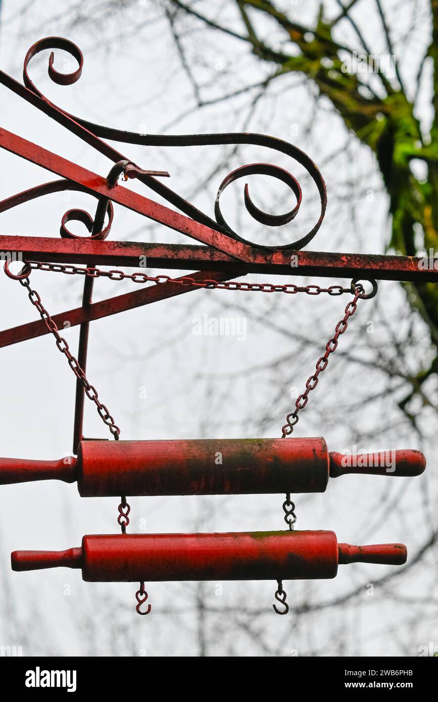 rolling pins part of hanging sign Stock Photo - Alamy