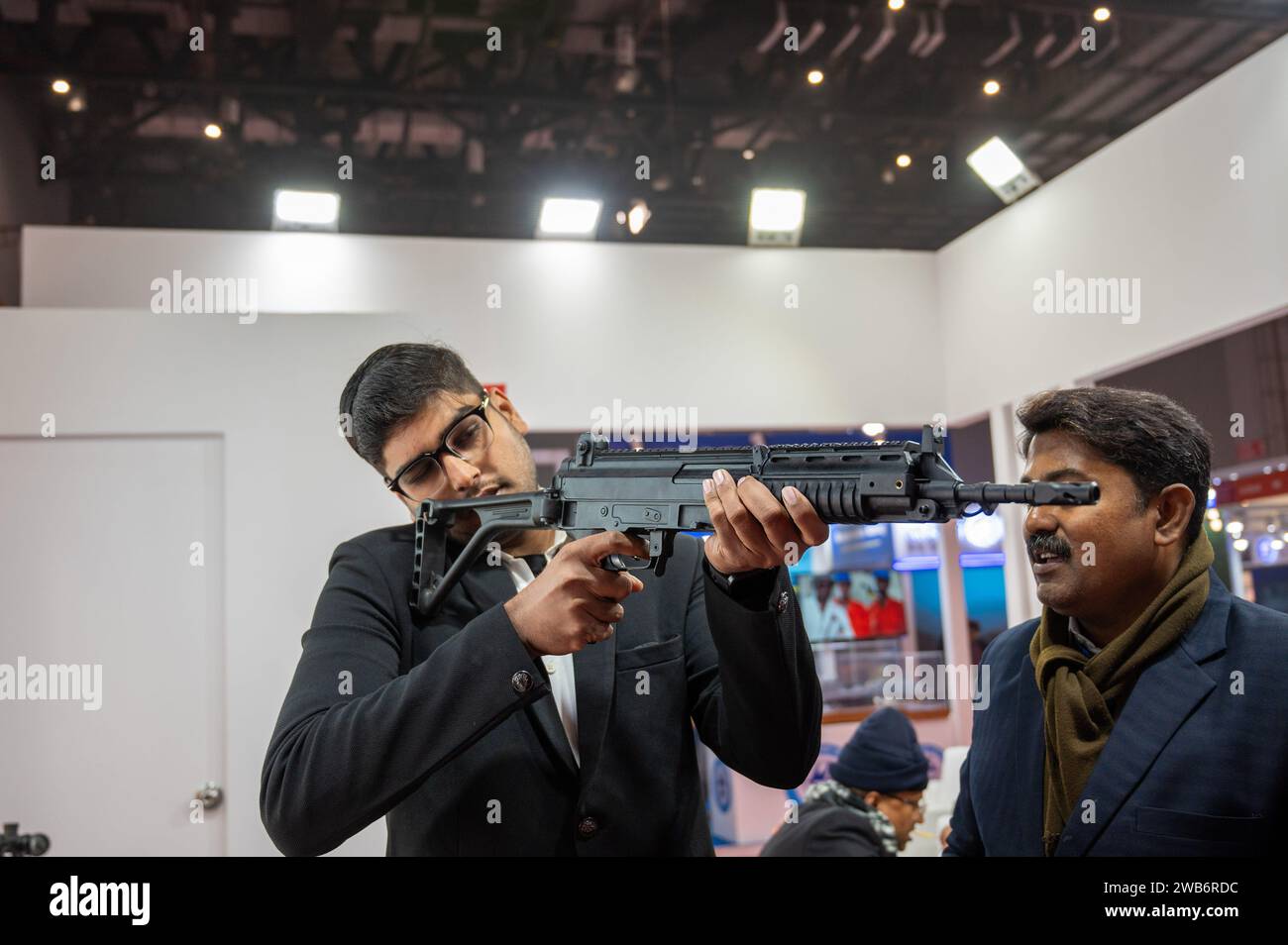 New Delhi, India. 08th Jan, 2024. A man holds a made-in-India weapon ...