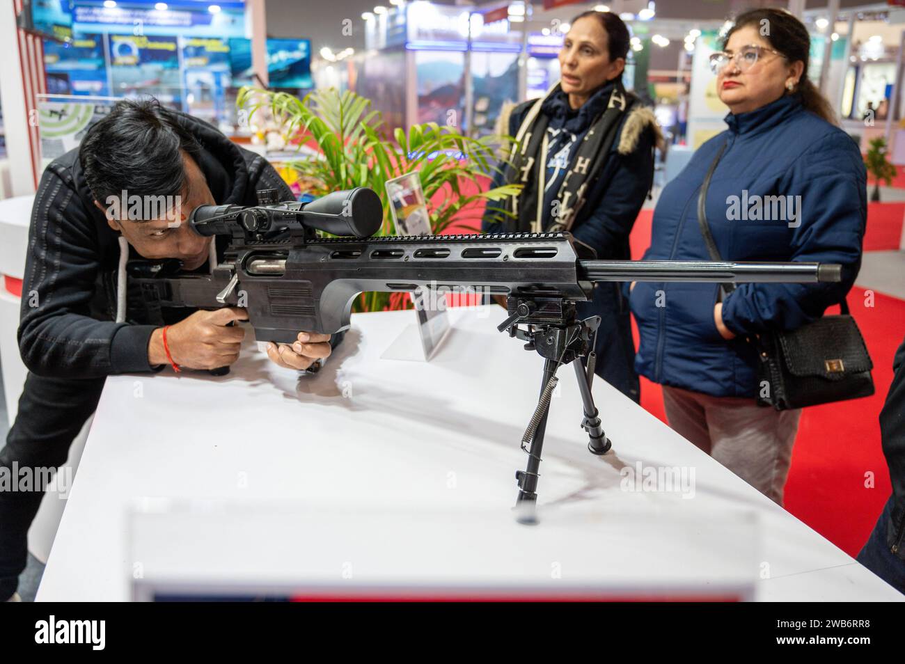 New Delhi, India. 08th Jan, 2024. Visitors look at the display of ...