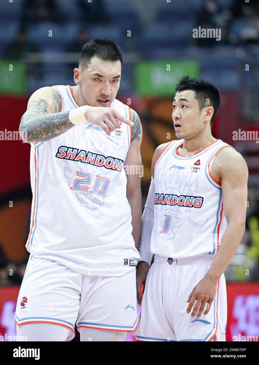 Beijing, China. 8th Jan, 2024. Tao Hanlin (L) of Shandong Heroes talks ...
