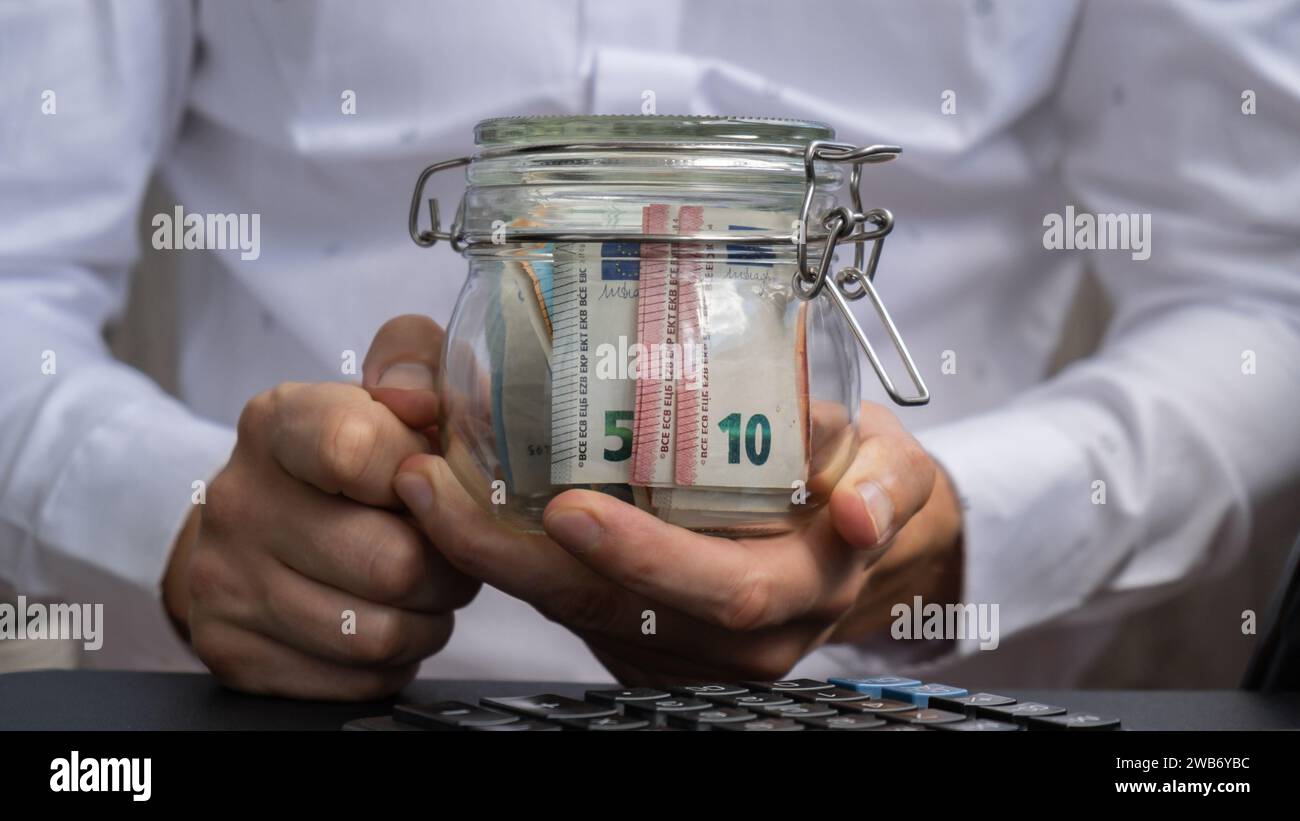Man collecting counting money hi-res stock photography and images - Alamy