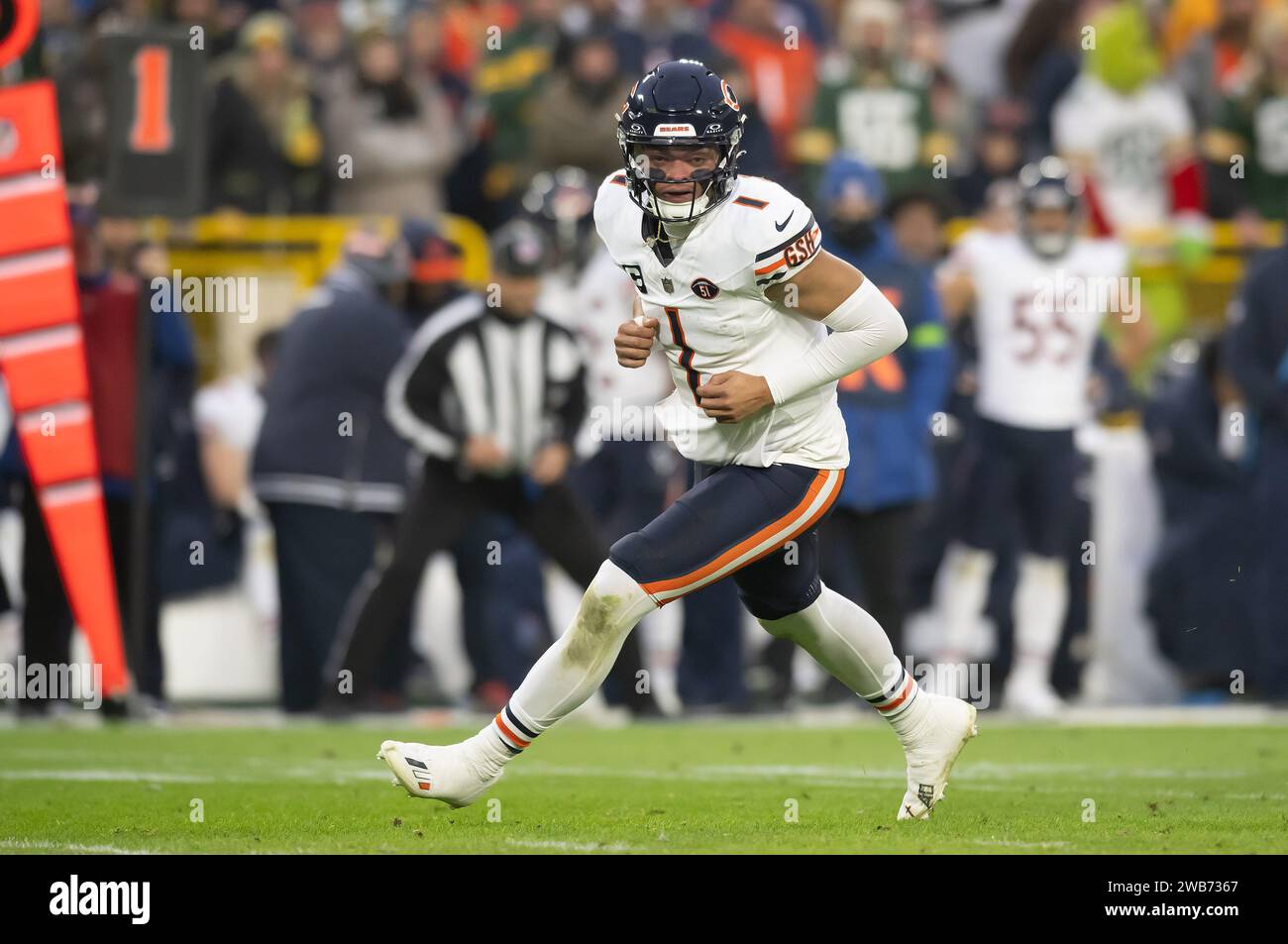 January 7, 2024: Chicago Bears quarterback Justin Fields (1) runs away ...