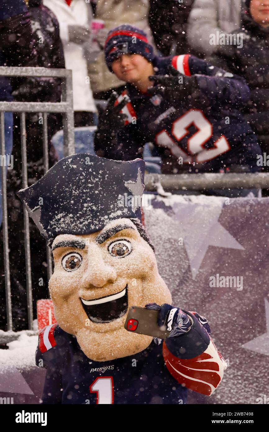 New England Patriots mascot Pat Patriot takes a selfie with a fan ...