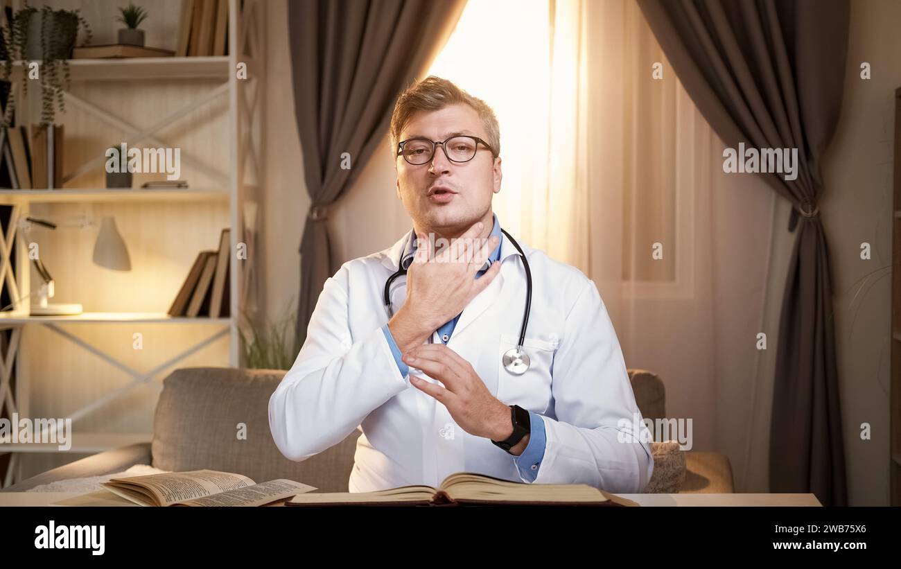 Doctor expertise man palpating video workplace Stock Photo - Alamy