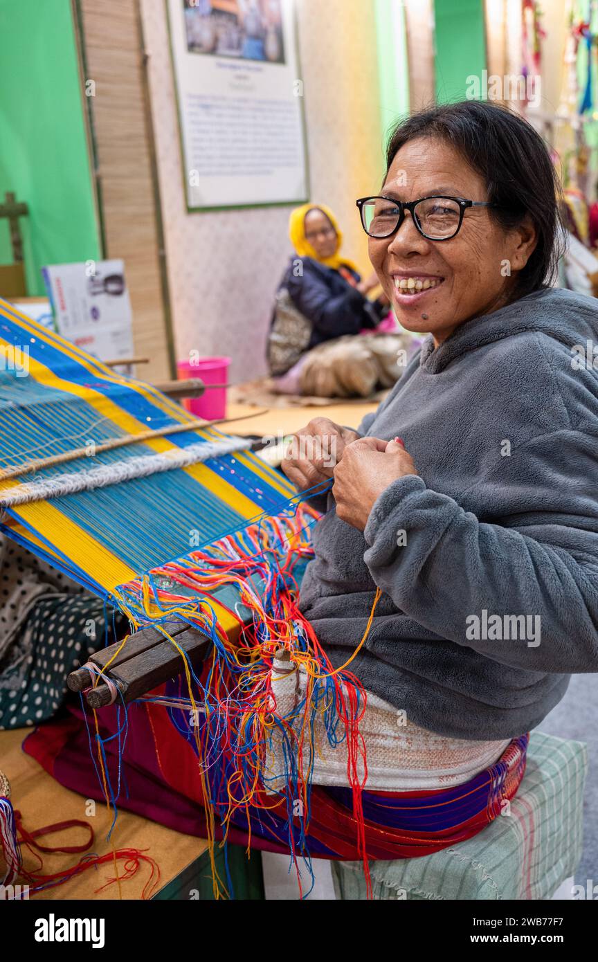 New Delhi, India. 08th Jan, 2024. An Indian artisan showcases her work ...