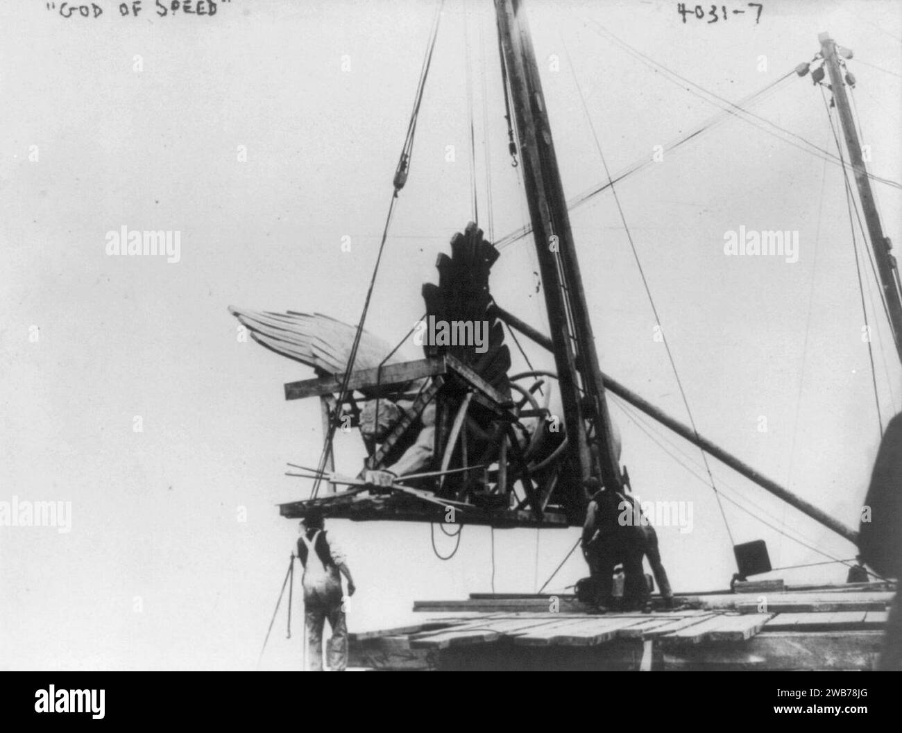 ''God of Speed'', Statue of Mercury being hoisted to top of AT&T ...