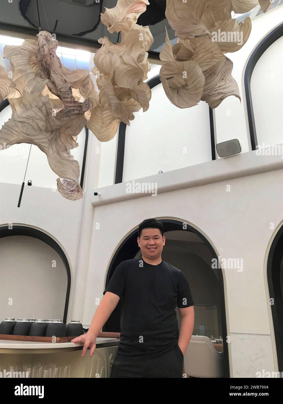 Zor Tan, chef and co-owner of Restaurant Born, 1 July 2023. Above him ...