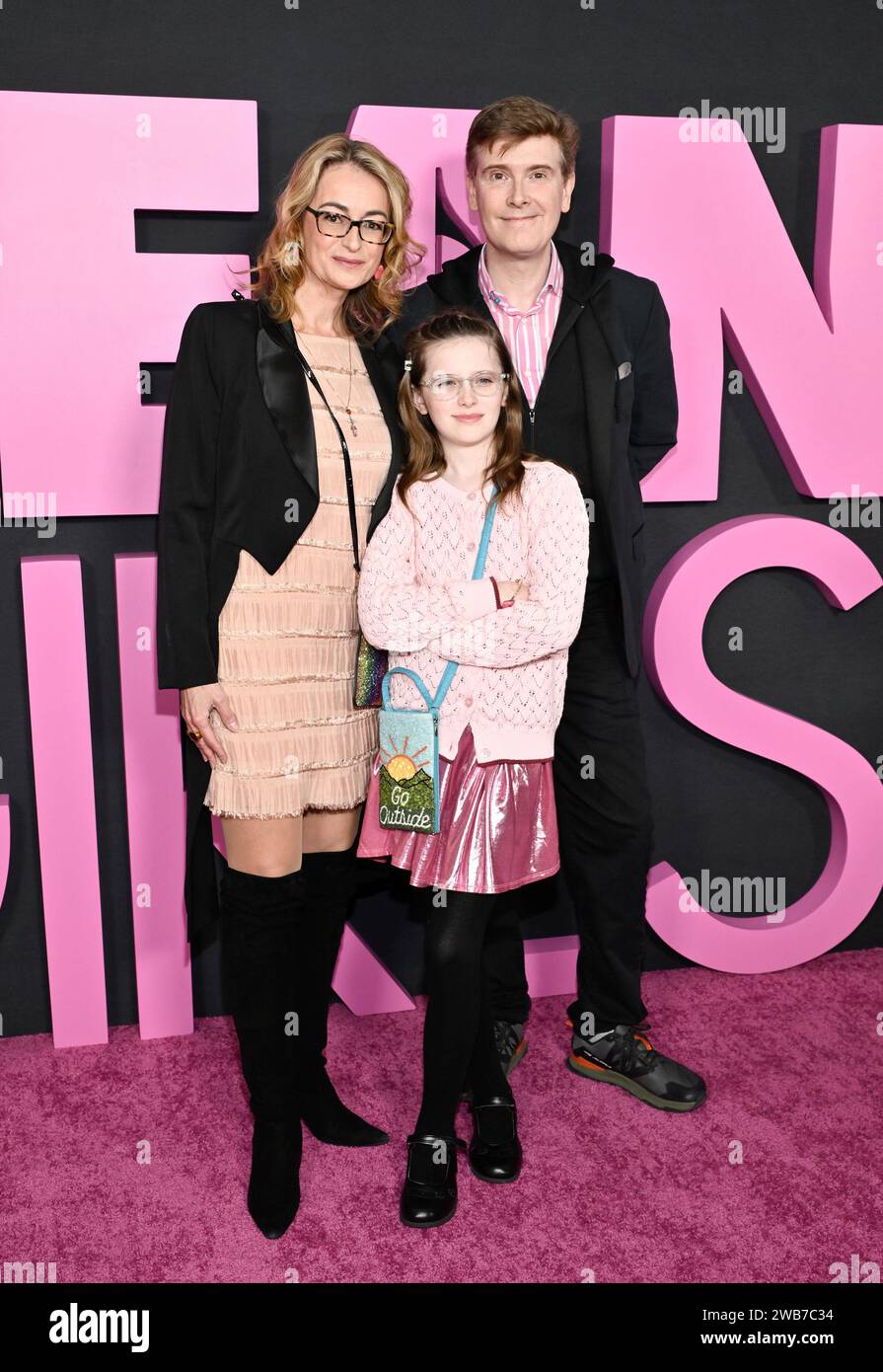 Nell Benjamin, left, and family attend the world premiere of "Mean ...