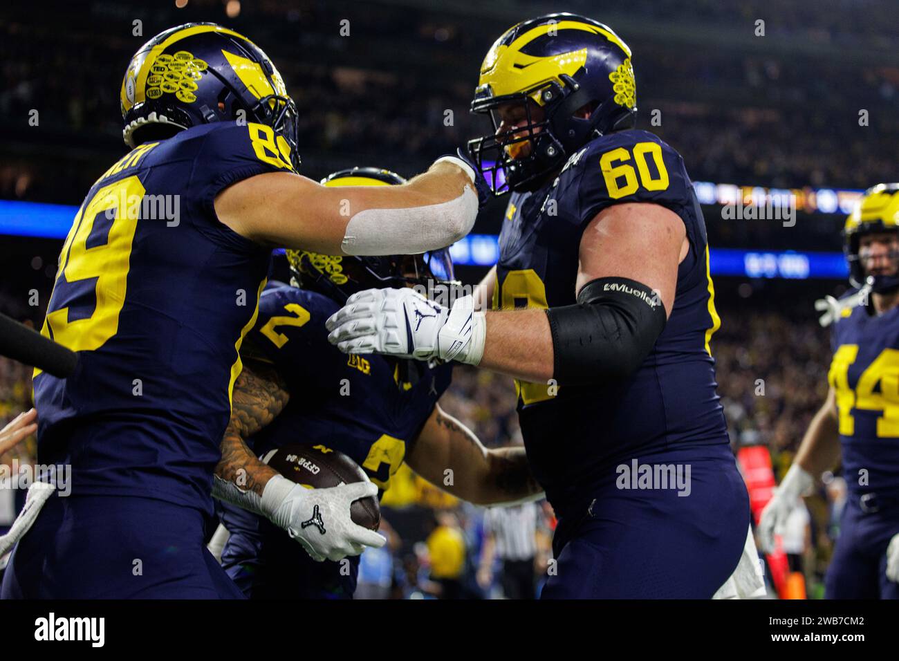 Houston, Texas, USA. 08th Jan, 2024. Michigan running back Blake Corum (2), Michigan tight end ...