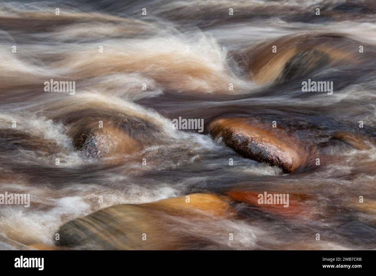 Fast flowing water over rocks. River Findhorn, Morayshire, Scotland ...