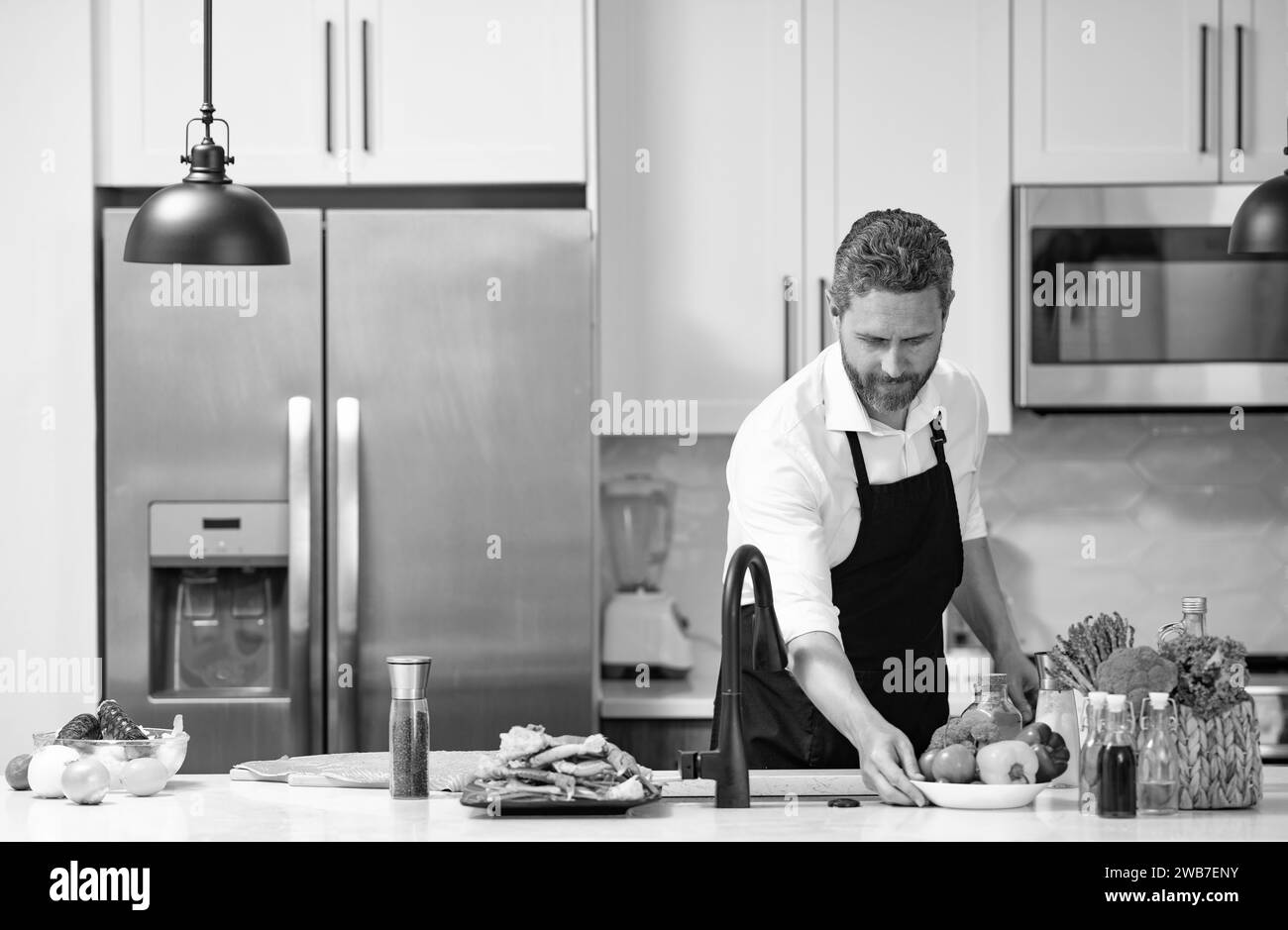 man cooking healthy food, banner. man cooking healthy food wearing ...