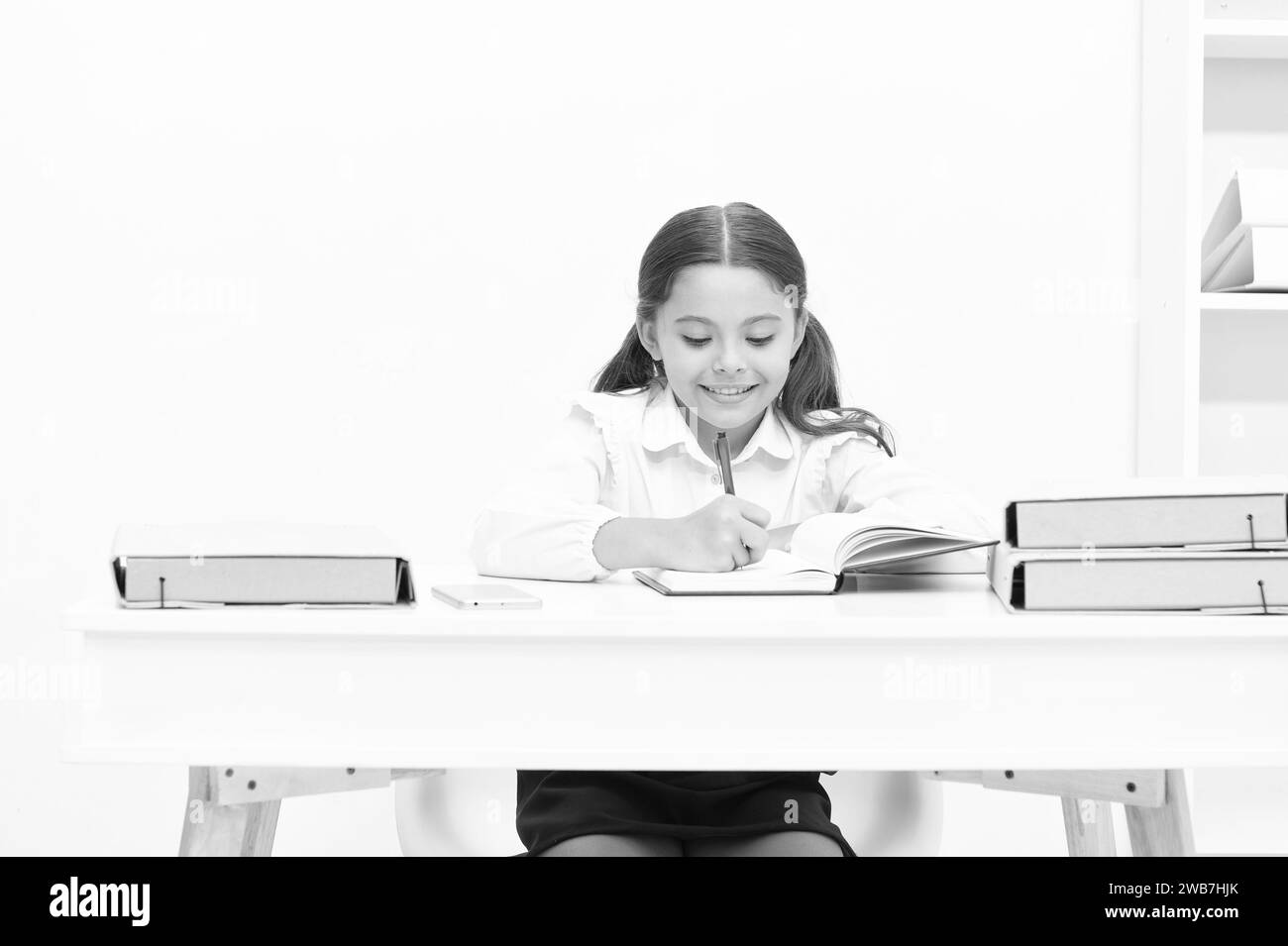 cute teen school girl noting in classroom. teen school girl noting at ...