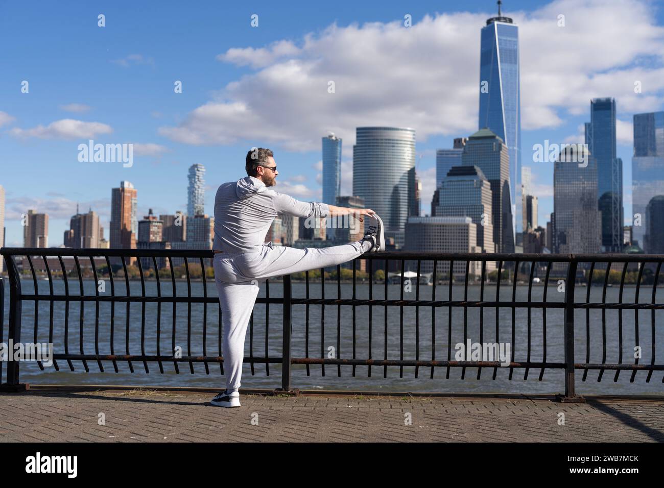 Athlete stretching muscles and preparing for workout. Stretching ...
