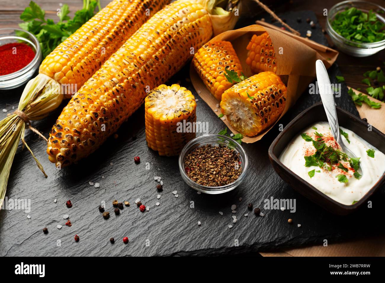 Grilled corn on the cob on kitchen table flat lay healthy food ...