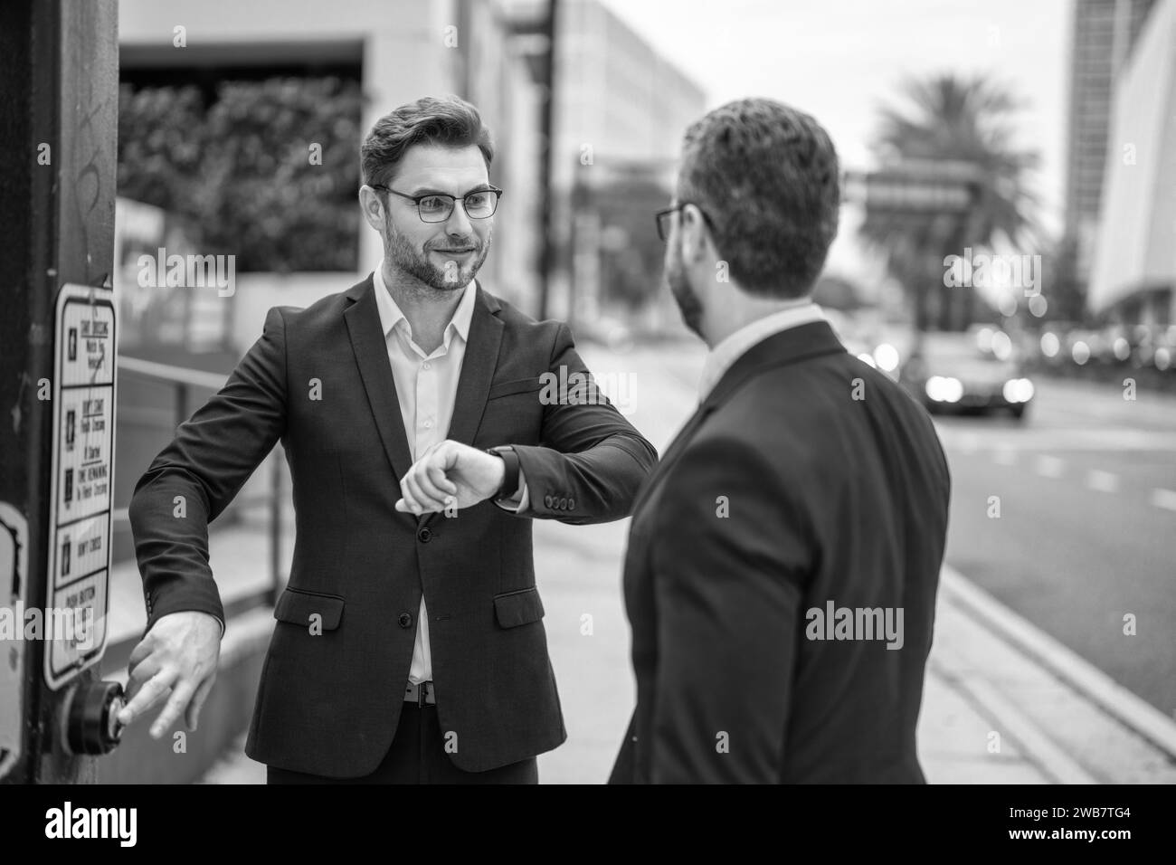 Suit check time Black and White Stock Photos & Images - Alamy