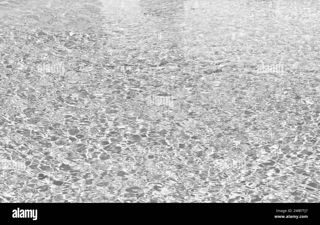 defocused summer swimming pool background with ripples. defocused ...