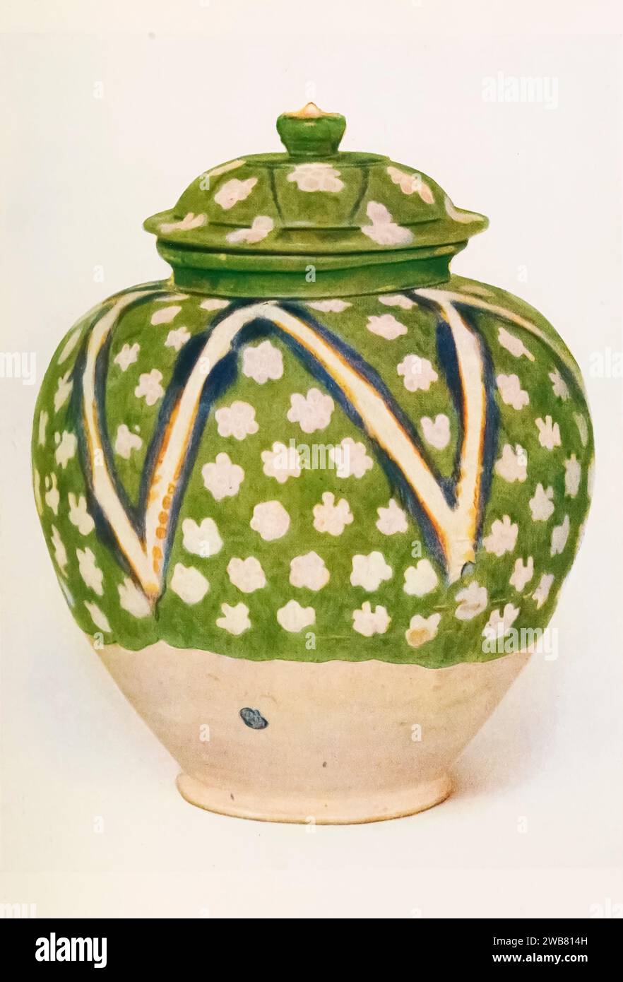 Jar and cover of light buff pottery with wash of white slip, the glaze ...