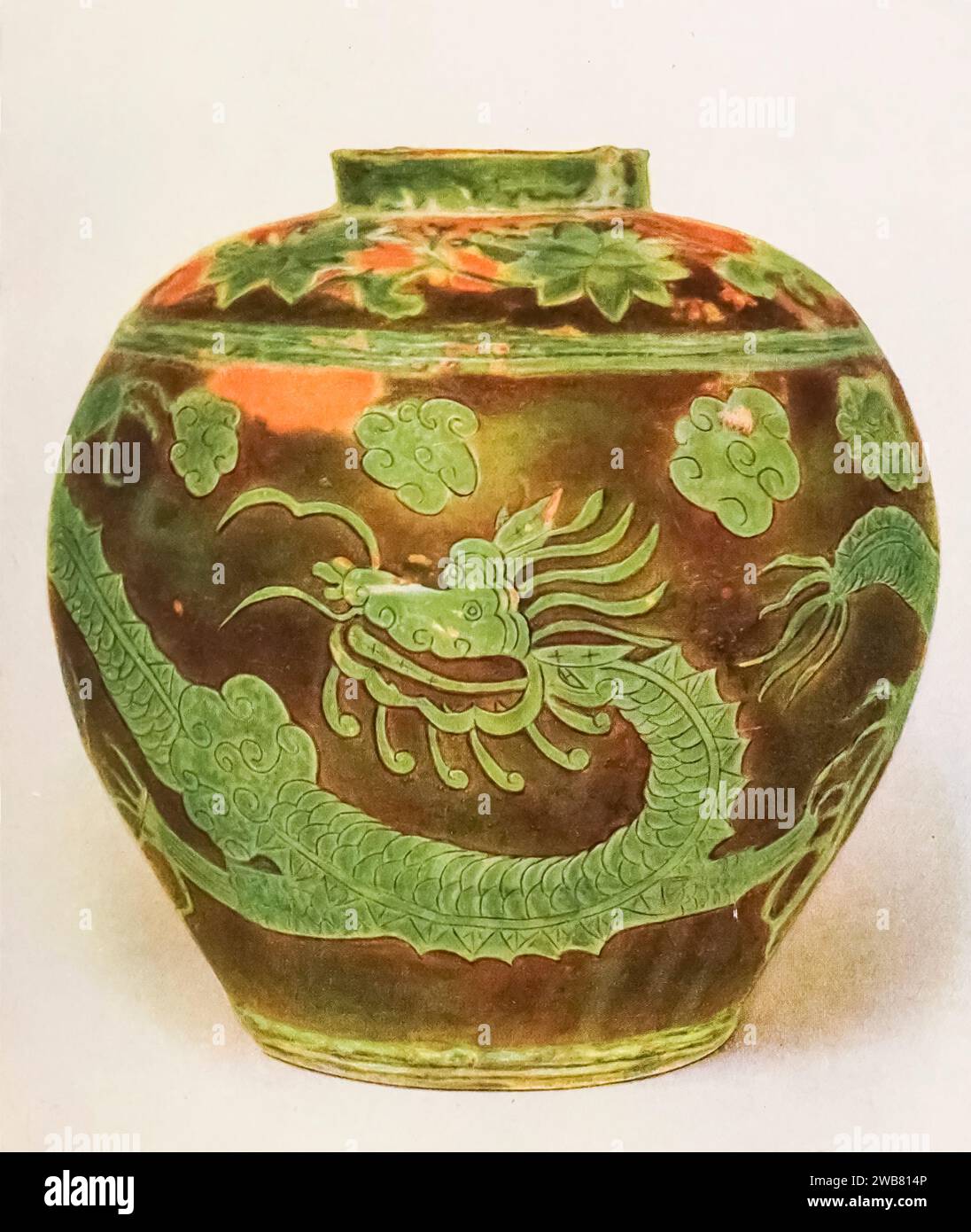 Vase of red pottery with white slip, which has been scraped off so as ...