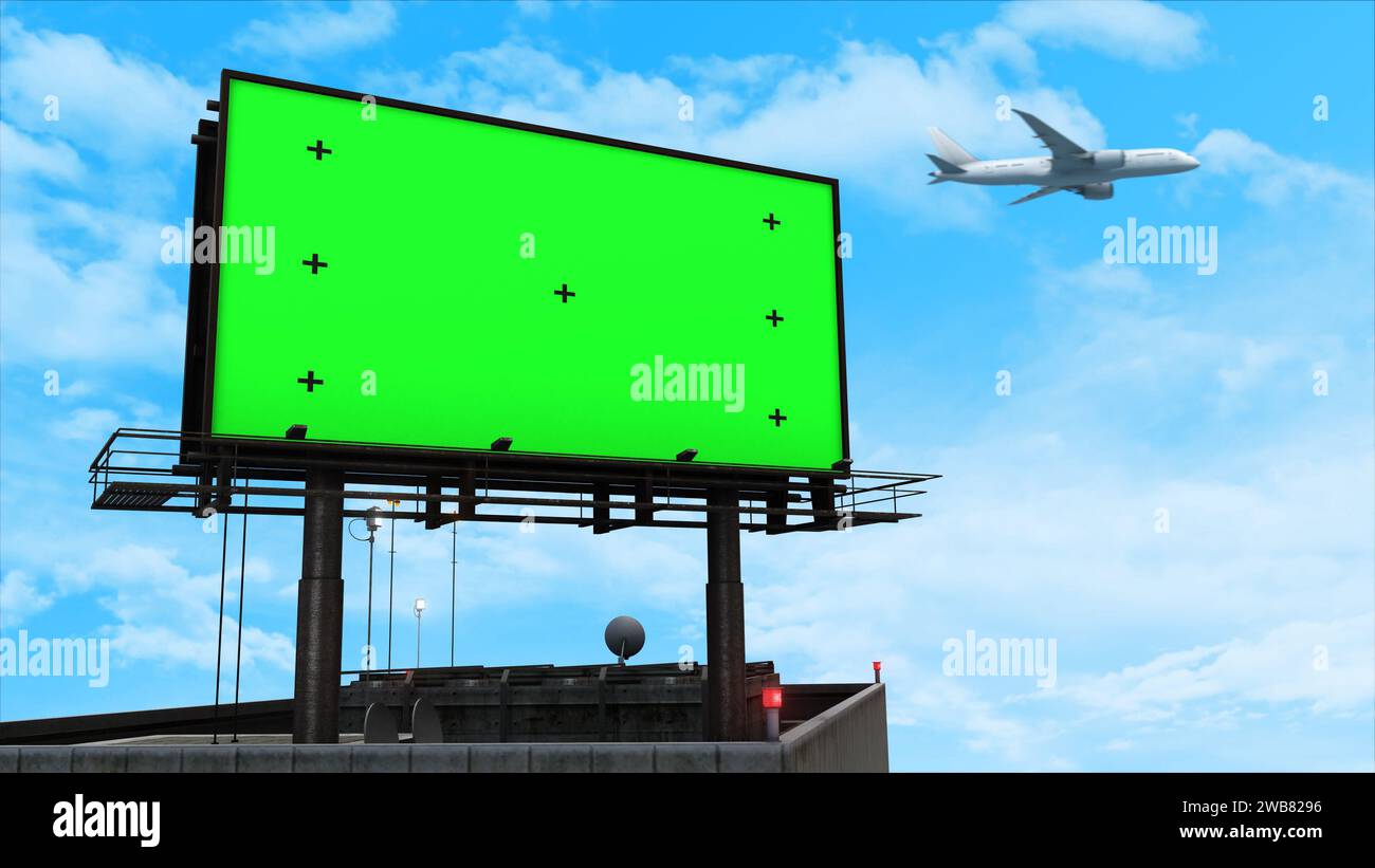 Large green screen billboard on the top of building Stock Photo - Alamy