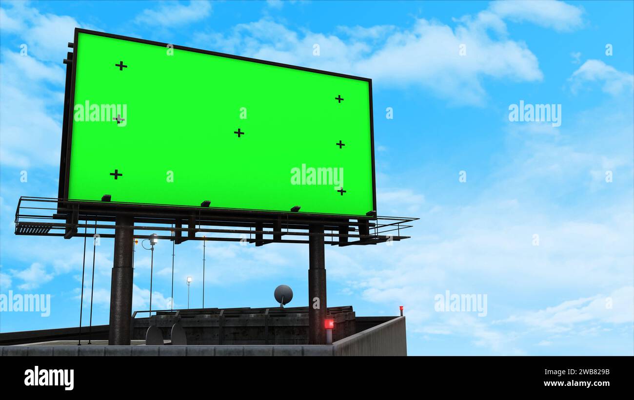 Large green screen billboard on the top of building Stock Photo - Alamy