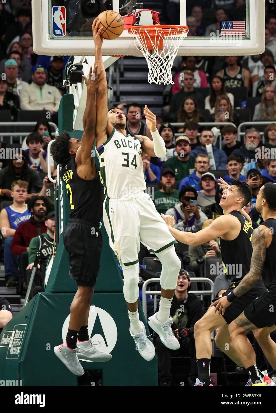 Milwaukee, USA. 9th Jan, 2024. Milwaukee Bucks forward Giannis Antetokounmpo (C) goes to the ...