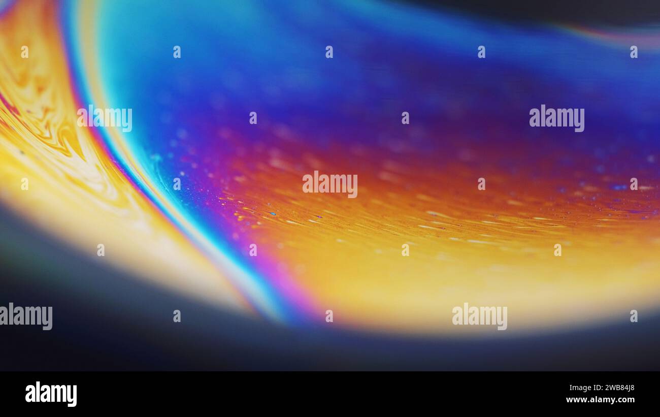 Dye mix. Oil fluid. Gasoline leak. Defocused rainbow color glowing ...