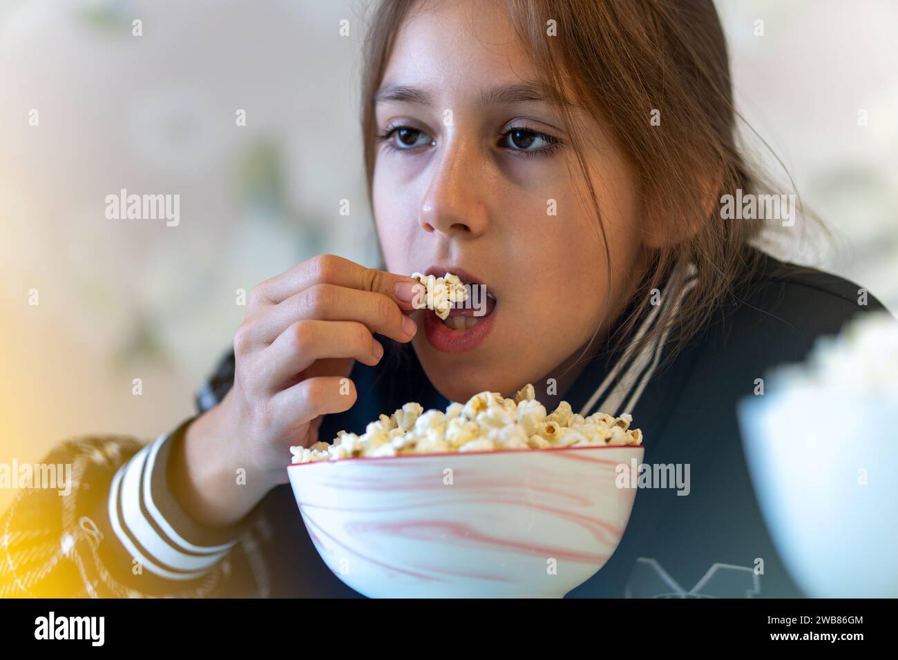 Close Up Portrait Of Nice Cute Attractive Cheerful Positive Girl Grasping Pop Corn In Hand