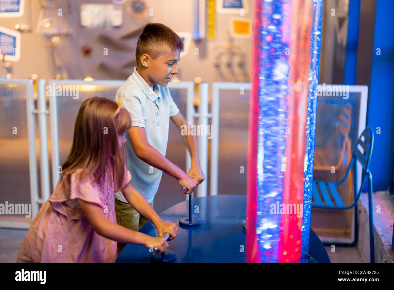 Kids playing in science museum Stock Photo - Alamy