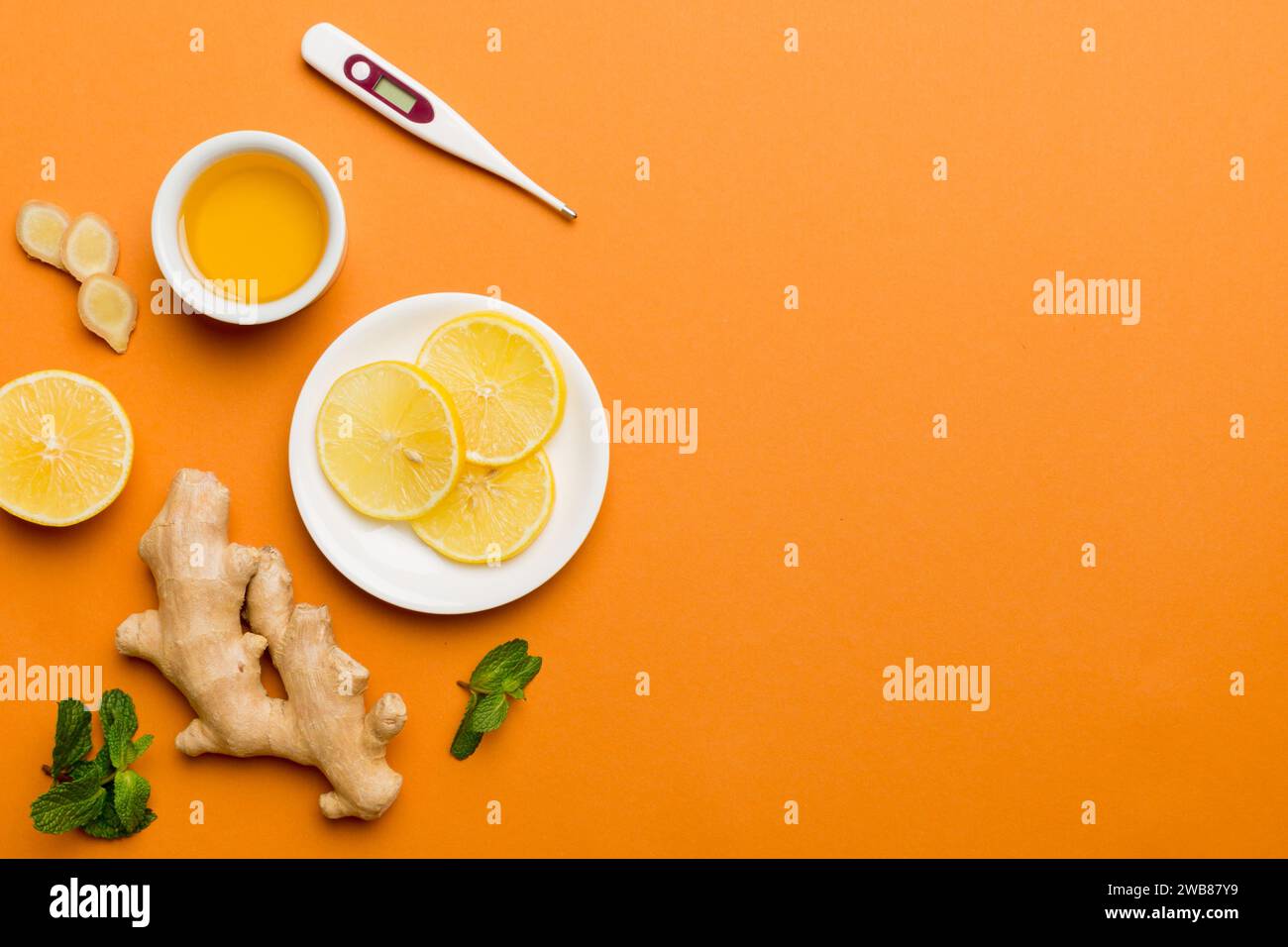 Natural cold and flu home remedies and thermometer. Natural ingredients ...