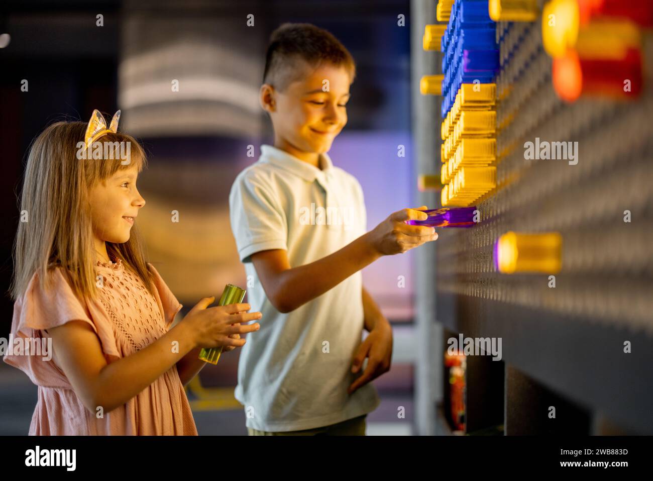 Kids playing in science museum Stock Photo - Alamy