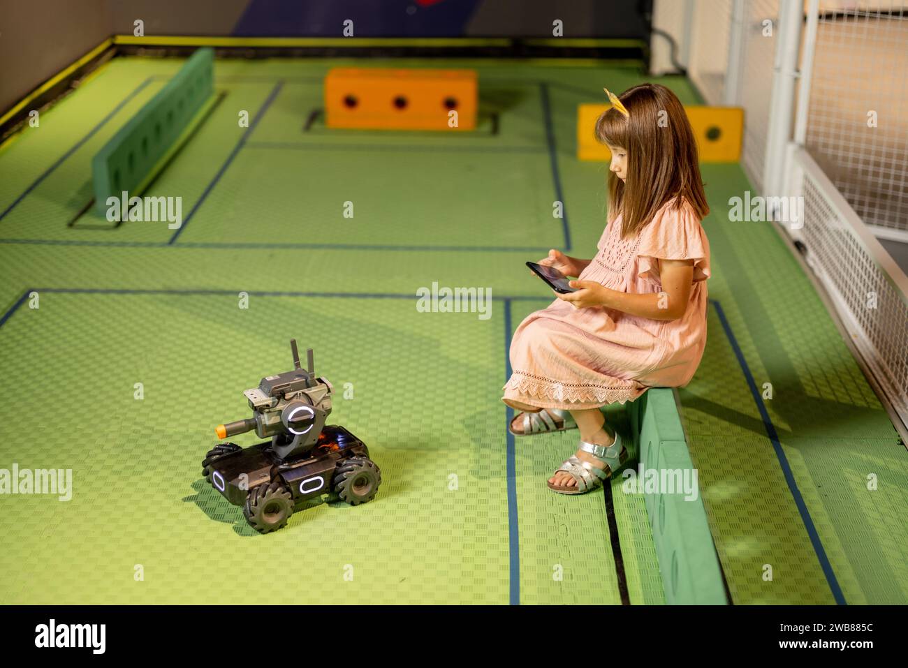 Kids playing with robotic cars Stock Photo - Alamy