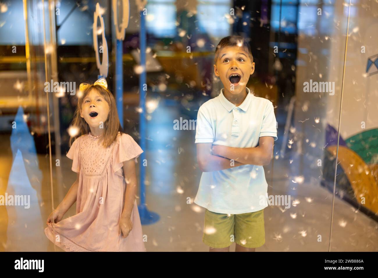 Little boy and girl visit a science museum Stock Photo - Alamy