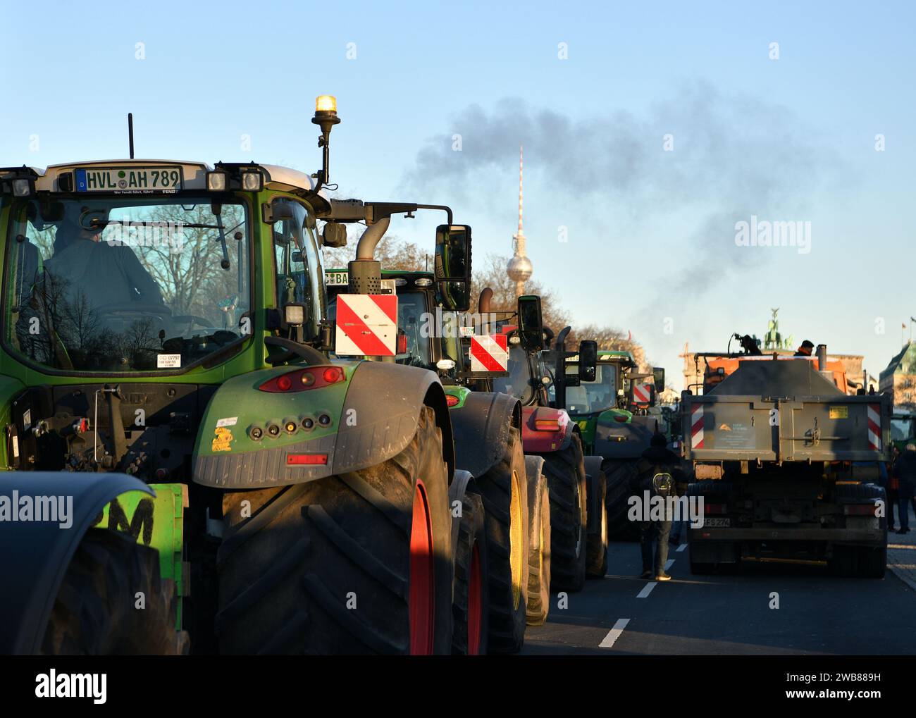 Berlin, Germany. 8th Jan, 2024. Tractors are seen during a protest near ...